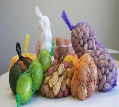 Cina Piccola borsa netta dell'imballaggio del PE del regalo della maglia del supermercato di plastica multicolore della borsa per le verdure in vendita