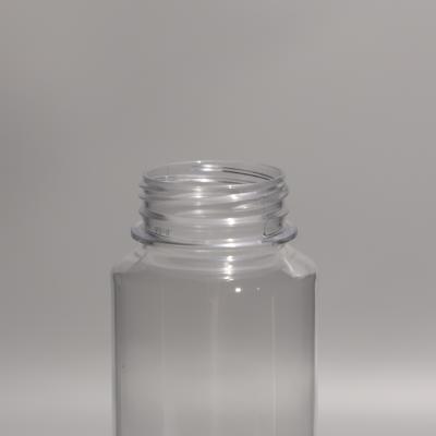 Cina Bottiglia in PET per bevande in plastica a prova di perdite priva di BPA con tappo in plastica/tappo in alluminio in vendita