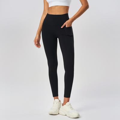 China 4 Way Stretch Yoga Leggings With Pockets High Waisted Light Blue Moisture Wicking for sale