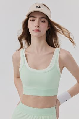 China Mint Green Two-Tone Padded Sports Bra for Yoga and Fitness with Breathable Stretch Fabric Support for sale
