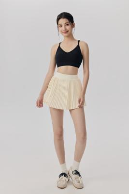 China Cream Double Strap V-Neck Sports Bra for Yoga and Fitness with Soft Breathable Fabric Support for sale