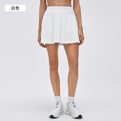 China Women's White Ribbed High Waist Flared Tennis Skirt with Built-in Shorts for Sports and Casual Wear for sale