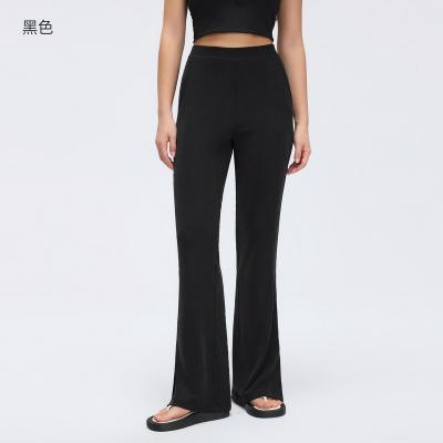 China Women's Black Ribbed High-Waisted Flare Pants with Side Slits for Casual and Athleisure Wear for sale
