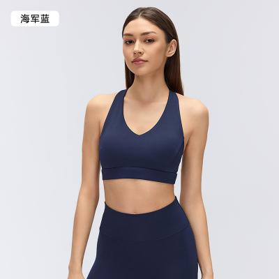 China Navy Blue V-Neck Racerback Sports Bra with Medium Support for Yoga and Workouts for sale