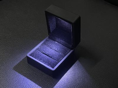 China Customized LED Two Ring Box Luxury Black Velvet Box with LED Plastic Box and Sponge for sale