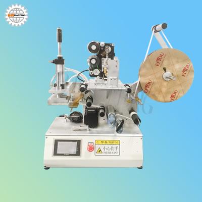 China Semi-automatic round bottle labeling machine plus coder for sale