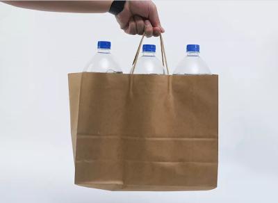Cina Borsa d'imballaggio di compera del regalo di LOGO Printing Kraft Takeaway Bags biodegradabile in vendita