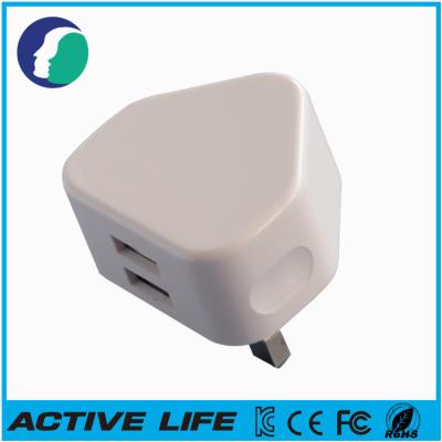 Cina Caricatore doppio BRITANNICO dell'adattatore di viaggio di USB del portatile con 100 - input 240V in vendita