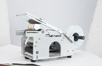 China DUOQI MT-50 Semi-Automatic Bottle Labeling Machine for 10-150mm Round Jars and Cans with 20-40 pcs/min Speed for sale