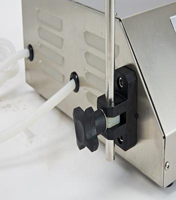 China Small Digital Control 3.2 L/min Bottle Liquid Filling Machine for Oil Pouch Packaging for sale