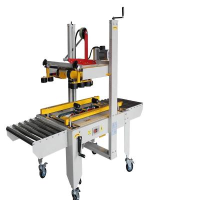 Chine Machine à sceller les cartons à bande à entraînement supérieur et inférieur semi-automatique à vendre