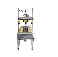 China FXJ-6050 Carton Sealing Machine 180W Automatic Box Taper with 1000 Cases/Hour Capacity and 500×600mm Max Sealing Size for sale