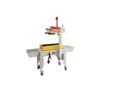 China FXJ-5050 Carton Box Sealing Machine 90 Mm 4 Corner Case Carton Sealer Machine for sale