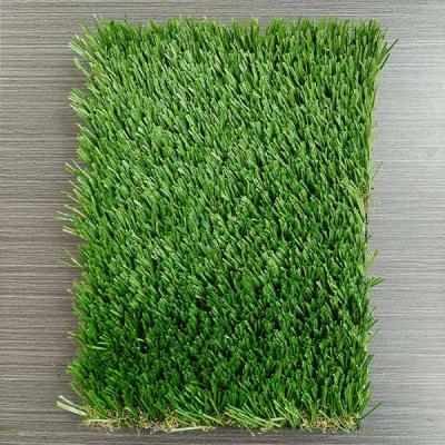 China 40 mm 14600 Dtex Landschapsbouw Falsch Kunstgras Met Perforatie Drainage Gaten En PU Adhesief Te koop
