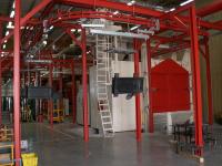 China Fully Automatic Monorail Shot Blasting Machine PLC Control HMI 500kg Capacity Continuous Workflow for sale