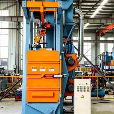 China Durable Spinner Hanger Shot Blasting Machine suitable for metal surface preparation and finishing in manufacturing processes for sale