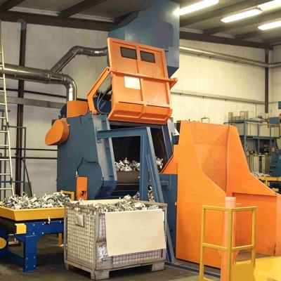 China Robust Drum Shot Blasting Machine Capable of Handling Large Quantities of Metal Parts for Surface Treatment and Cleaning for sale