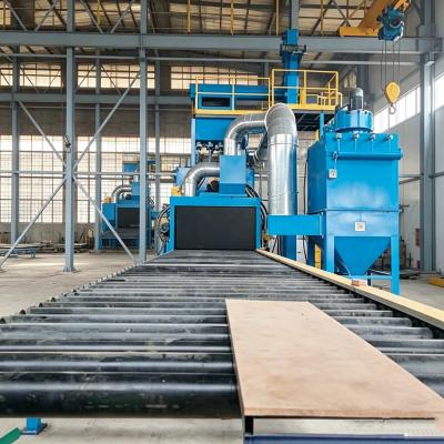 China Roller conveyor shot blasting machine with adjustable speed PLC control and wear-resistant manganese steel liner for steel profiles for sale