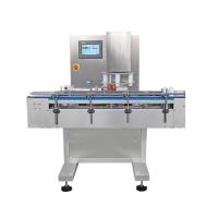 China Automatic Cotton Inserting Machine 0.6Mpa 0.7kw Pharmaceutical Bottle Packaging Equipment for sale