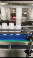 China Automatic Cotton Inserting Machine 0.6Mpa 0.7kw Pharmaceutical Bottle Packaging Equipment for sale