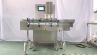 China Automatic Cotton Inserting Machine 0.6Mpa 0.7kw Pharmaceutical Bottle Packaging Equipment for sale