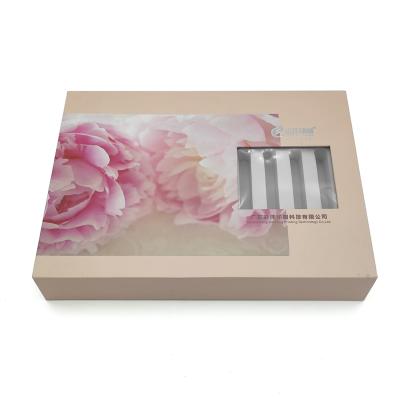 China Magnetic Flip Cosmetic Packaging Box Skincare Makeup Set Cardboard Gift Boxes With Window for sale