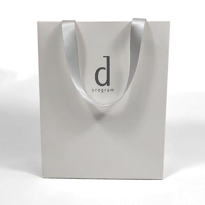 Cina Stampa offset con manicotto di patch, sacchetto di carta per acquisti personalizzati durevoli e riciclabili in vendita