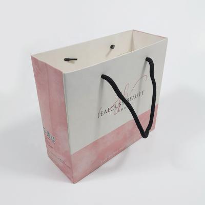 Cina Carta di stampa offset Borse per imballaggio regalo Abbigliamento cosmetico di lusso Borse regalo in vendita