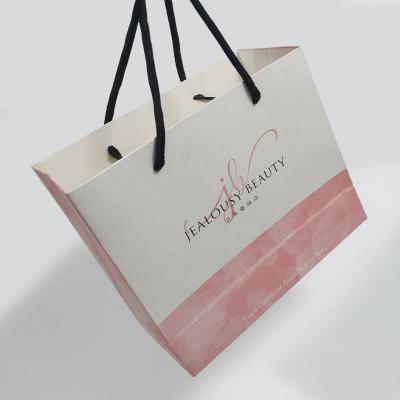 Cina Carta di stampa offset Borse per imballaggio regalo Abbigliamento cosmetico di lusso Borse regalo in vendita
