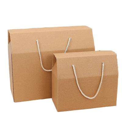 China Custom Recycled Kraft Paper Box with Rope Handle Made from Art Paper for Food Grade Packaging for sale