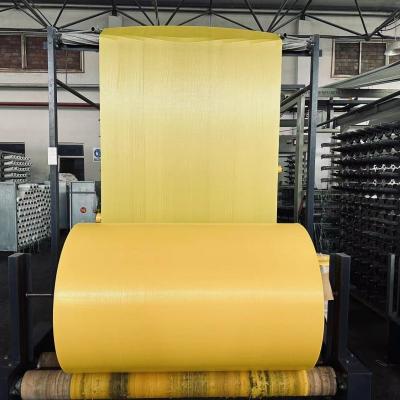 Cina 60-90gm larghezza circolare 45-80cm Tubo PP tessuto tessuto rotoli sacchetto rotoli stratificati multi colore personalizzato in vendita