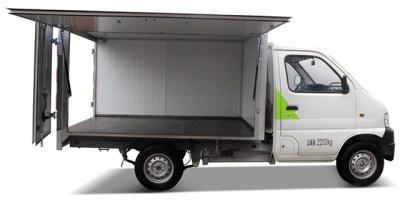 China Minibus elétrico 4X2 1T Van de extensão de asas Janela manual fileiras de assentos Meia fileira Eco-friendly à venda