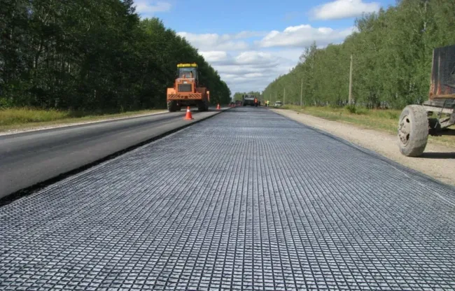 Composite Biaxial Fiberglass Geogrid with Nonwoven Geotextile for Soil Reinfocement/Road Construction Material Geocomposite Geogrid