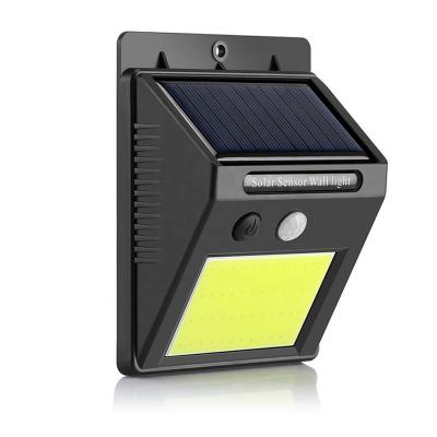 Cina Hot Sale LED COB Solar Wall Mounted Garden Light , IP 65 Waterproof Outdoor Solar Garden Light in vendita