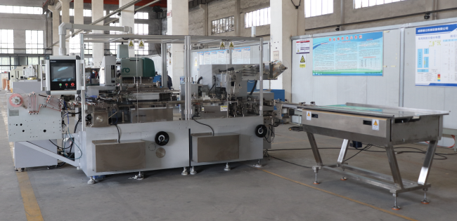 Close-up view of chocolate packaging process