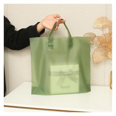 China Customized Size Custom Logo Die Cut Plastic Bag LDPE Clothing Shoes Gift Thank You Packaging Bag PVC Handle Shopping Bag for sale