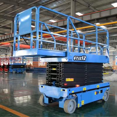 China Mini Type Electric Aerial Working Scissor Lifting Platform 4m 6m 8m Traction Mobile Lifter Scaffolding 300kg Hydraulic Scissor Lifting Platforms for sale