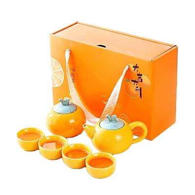 China Relações com os ex-alunos Set de chá Dajidali Desejo de coração Caixa de presente laranja com quatro copos e uma chaleira à venda