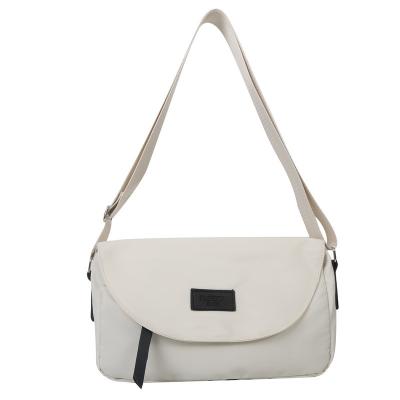 China Klantenlogo Modieus Pendeltas Vaste Kleur Eenvoudige Crossbody Tas Werknemer Geschenk Te koop