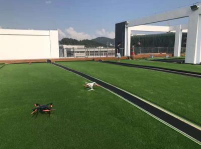 China PP Net SBR Latex Artificial Grass Turf 12-20 Stitches PP Woven Bag Drainage Holes for sale