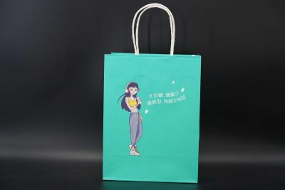 China Custom Kraft Paper Packaging Bag Personalized Printed Paper Bags With Handles for sale