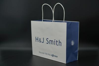 China Luxury Coated Eco Paper Bags Packaging Biodegradable With Twisted Paper Handles for sale