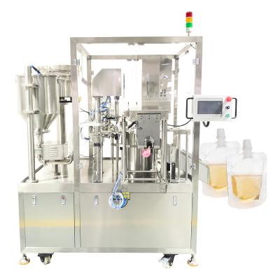 China Dual-head Fully Automatic Nozzle-type Filling Sealing and Labeling Machine Plastic Bagged Liquids Pastes Easy to Operate for sale
