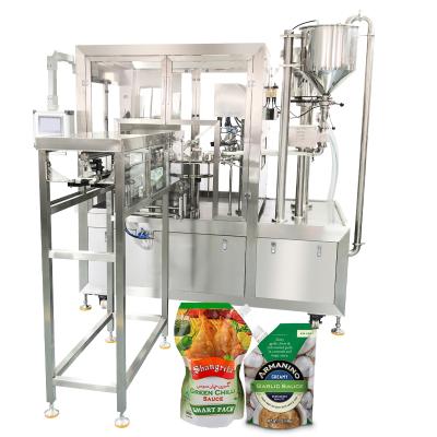 China Four-Head Spouted Pouch Capping Machine — High Speed ​​& Precision: Supercharge Your Production Capacity for sale