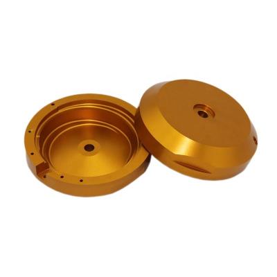 Cina 6061 parte di giro di alluminio anodizzate gialle scure di CNC in vendita