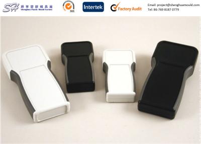 China Hand Held Portable Device Plastic Housing with Over Molded Soft Rubber Grip for sale