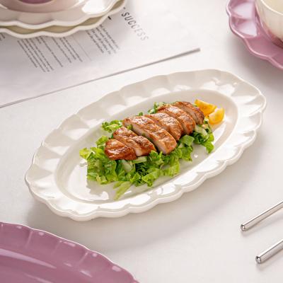 Cina Piatti lunghi piatti ovali in ceramica moderna per ristoranti set di posate di porcellana nordica in vendita