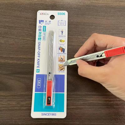 China Silver Steel Knife Body And Red Tail 9mm Utility Knives with Retractable Blade and Efficiency for sale