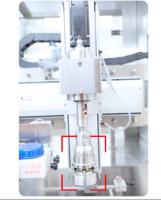 China FXG-1 Automatic Capping Machine 1500 BPH for 5-30L Drums with Schneider Controls for sale