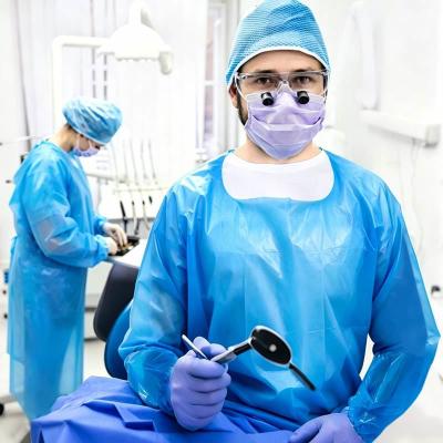 China 80g Heavy-Duty CPE Isolation Gown with Elastic Cuffs and CE Certification for Maximum Fluid Protection for sale